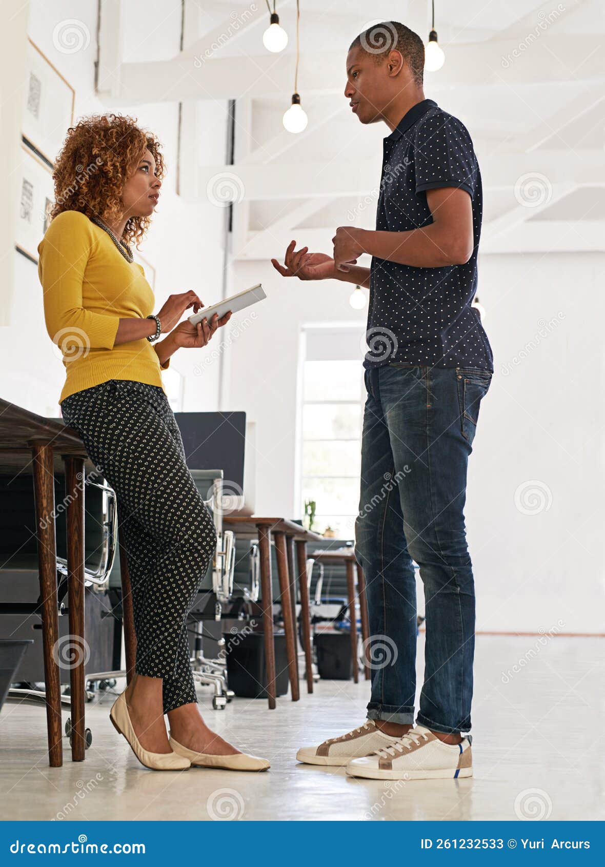 Exploring Different Ideas Together. Two Colleagues Having a Discussion ...