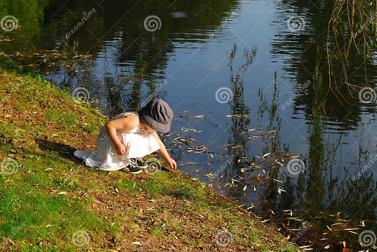 Exploring Nature N White Skirt Stock Photo - Image of skirt, crouching ...