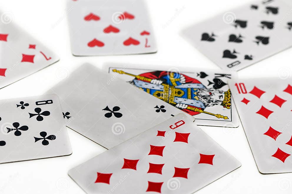 Exploring Strategy and Chance with a Vibrant Deck of Cards Scattered ...
