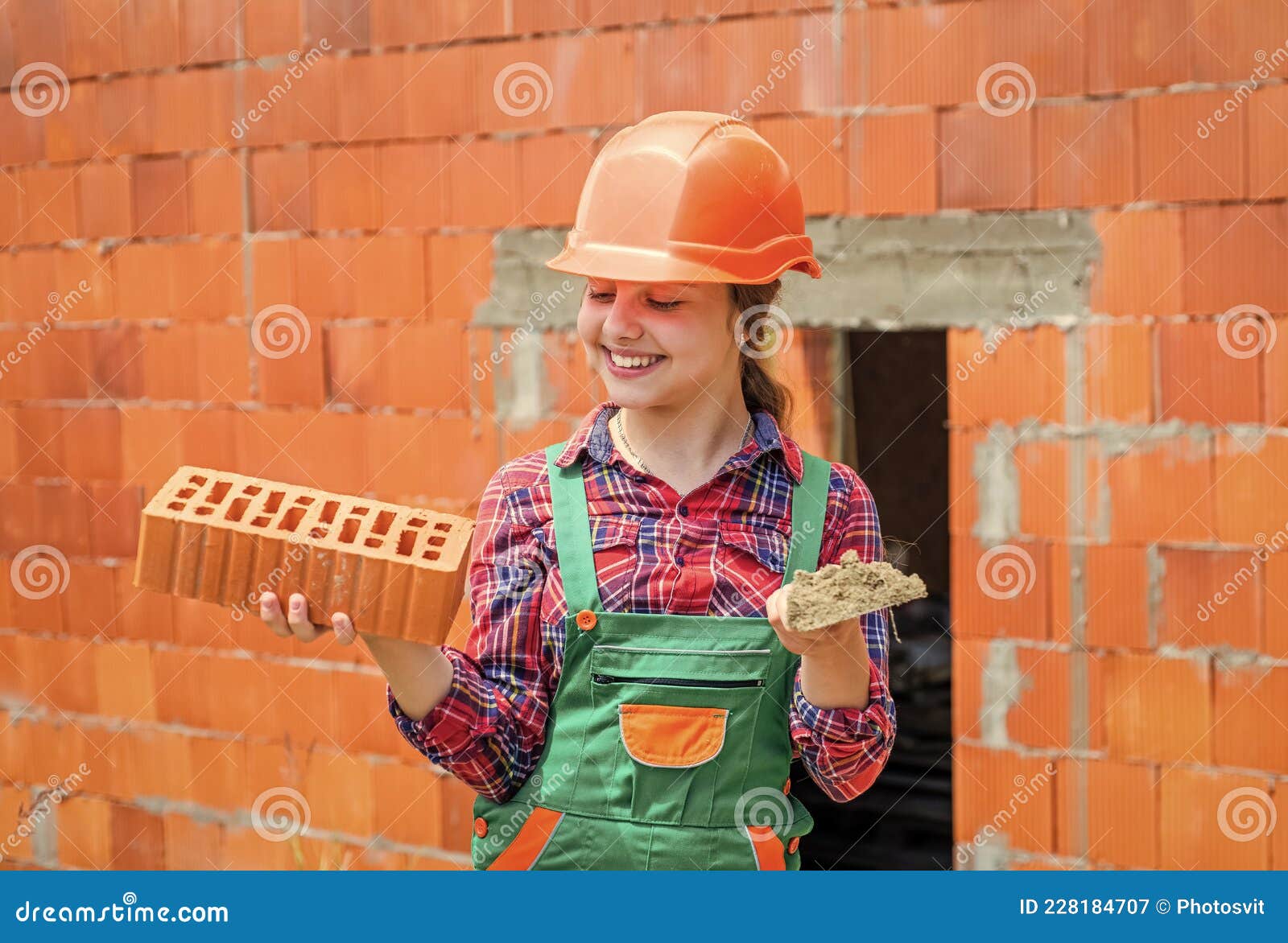 Exploring Tools. Future Engineer. Happy Kid Use Brick For Renovation ...