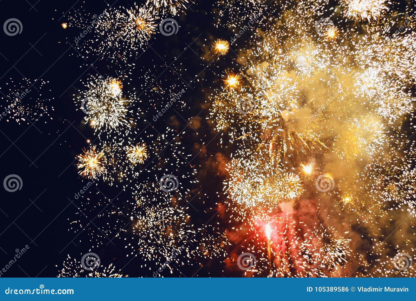 Exploding Golden Bright Fireworks Against a Night Sky Stock Photo ...