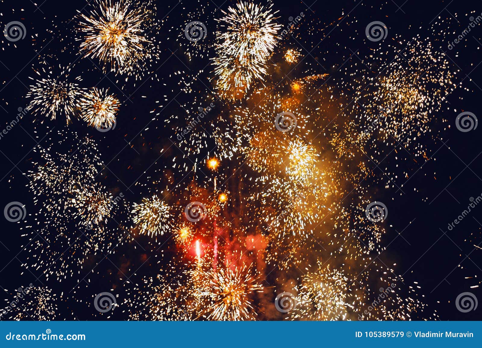 Exploding Golden Bright Fireworks Against a Night Sky Stock Image ...
