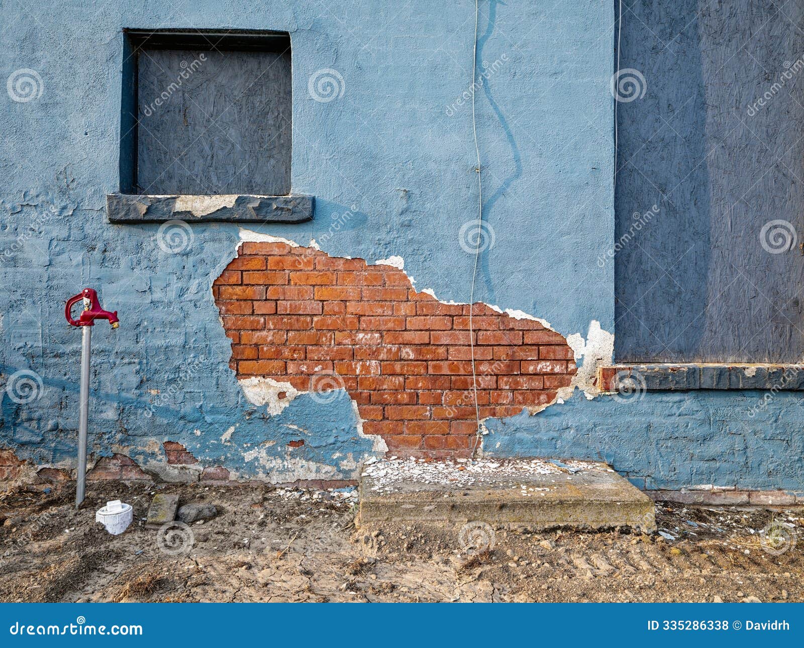Exposed Bricks in an Exterior Wall of an Abandoned Building Where the ...