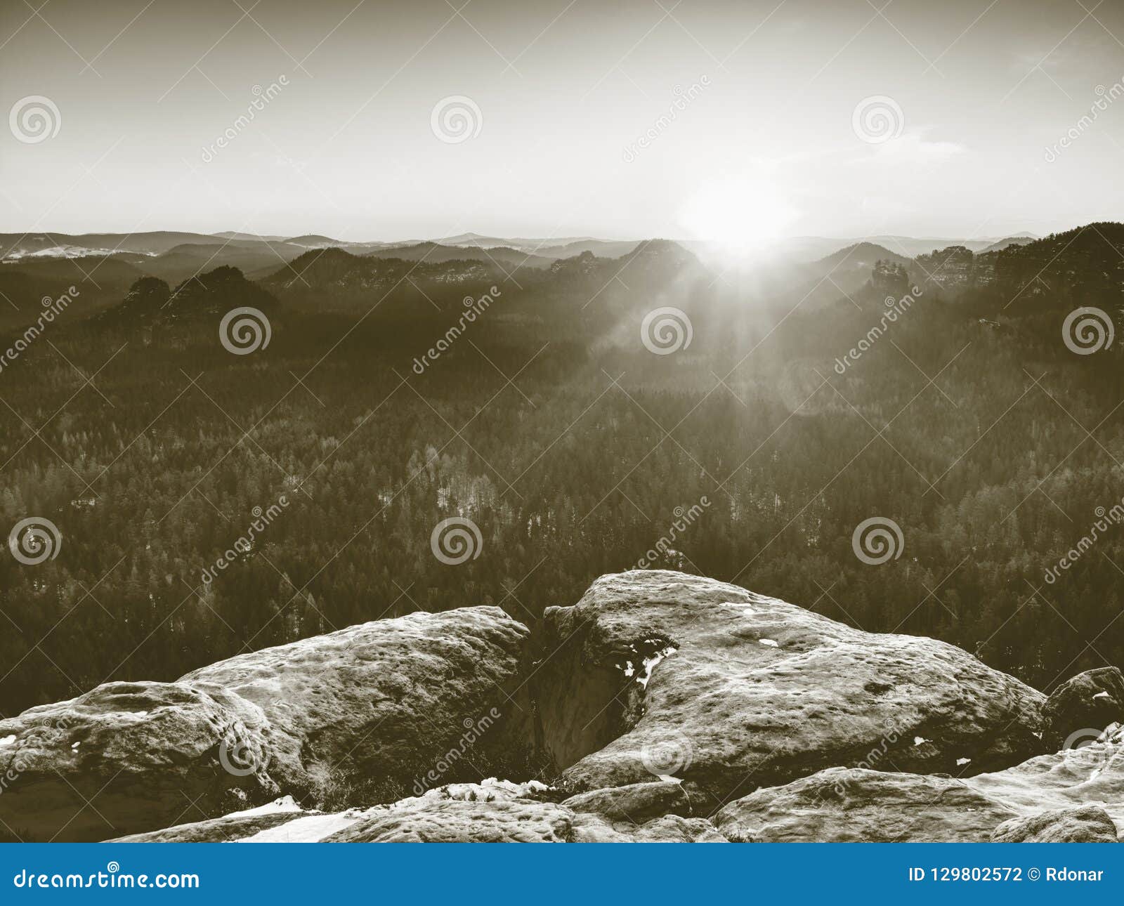 Exposed Sandstone Cliff Above Mist at Beginning of Spring Stock Photo ...