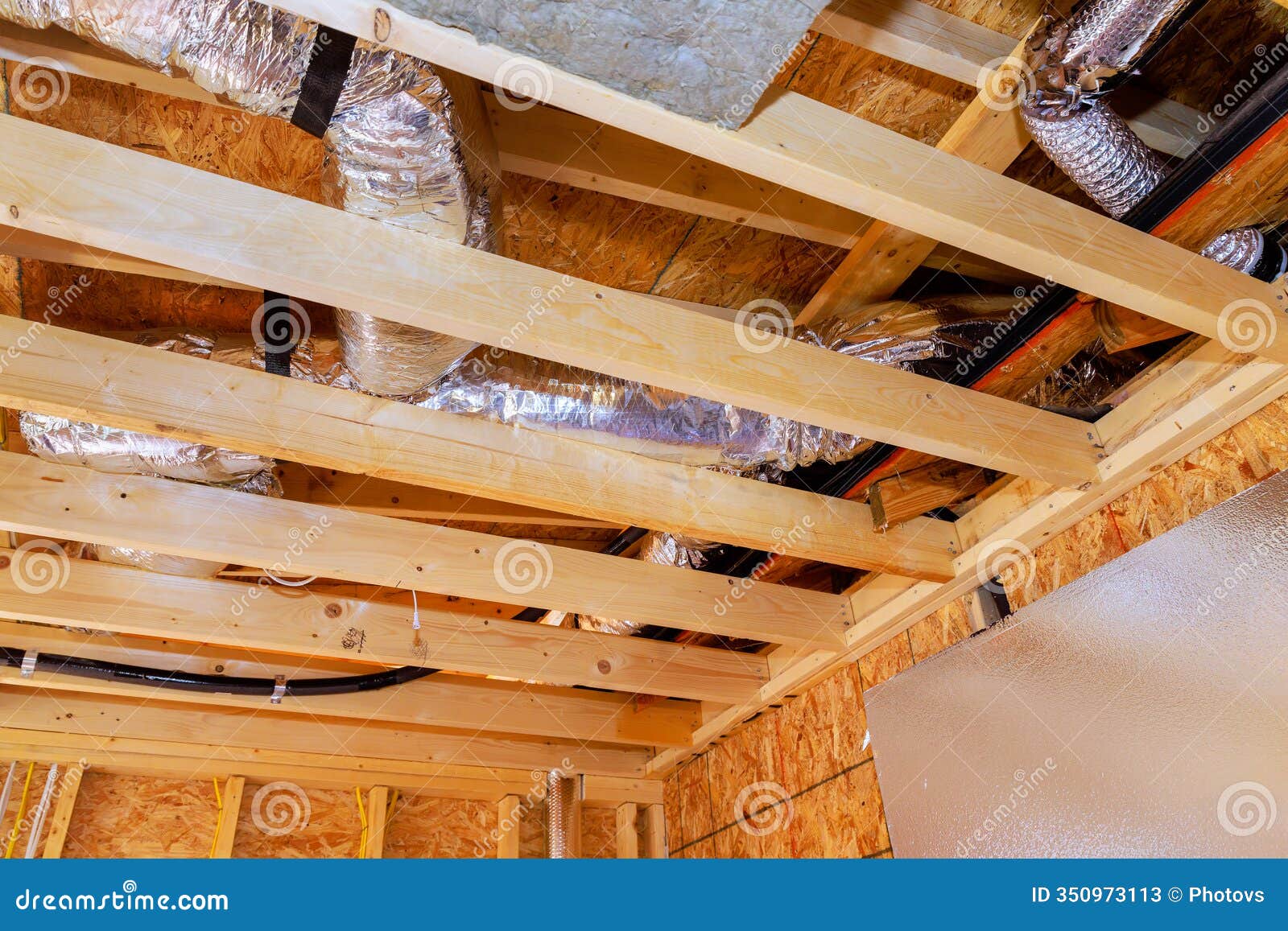 Construction of a Residential Ceiling with Exposed Ductwork and Framing ...