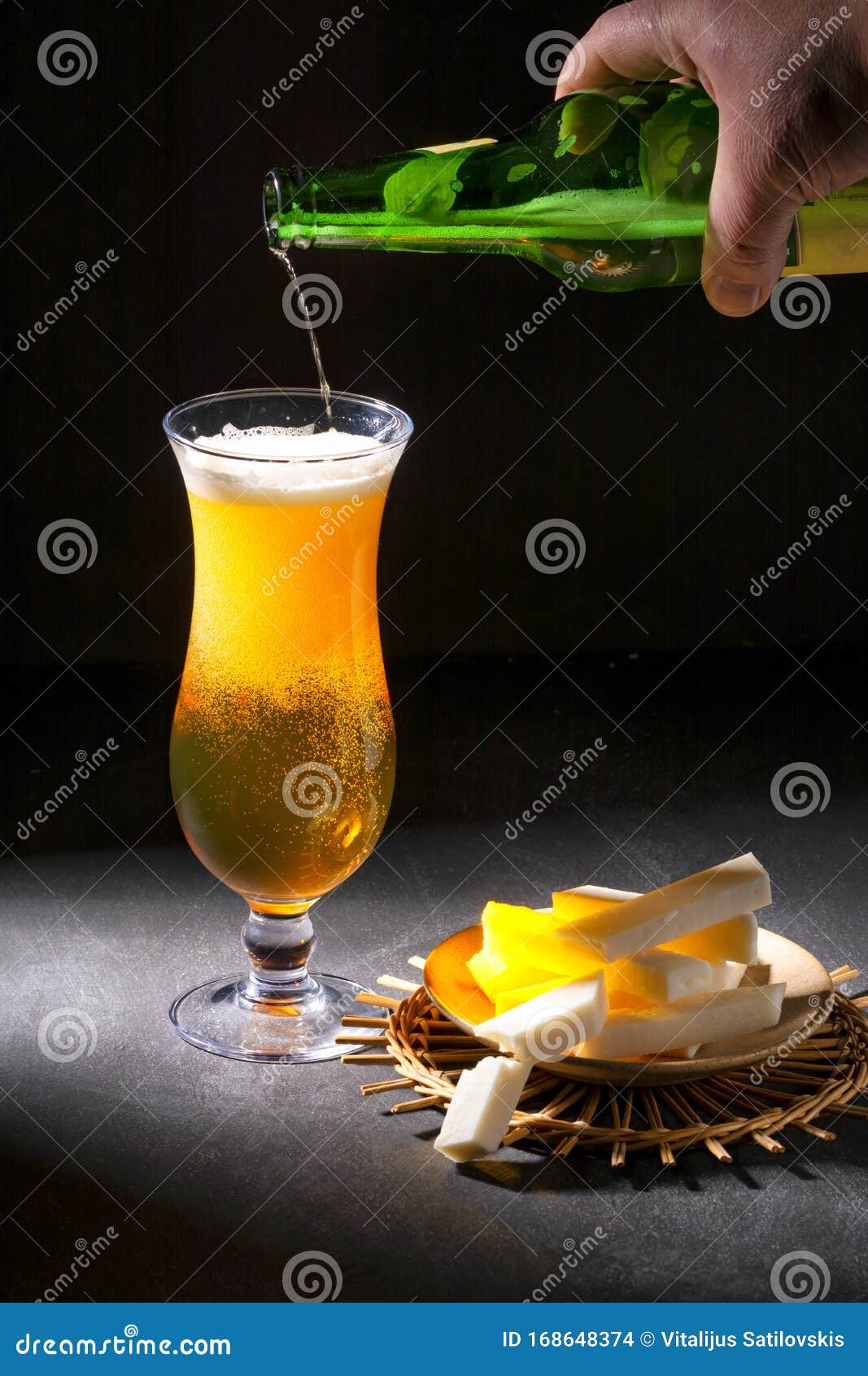 Exposition of Cheese with Beer on Black Background. Beer with Snacks ...
