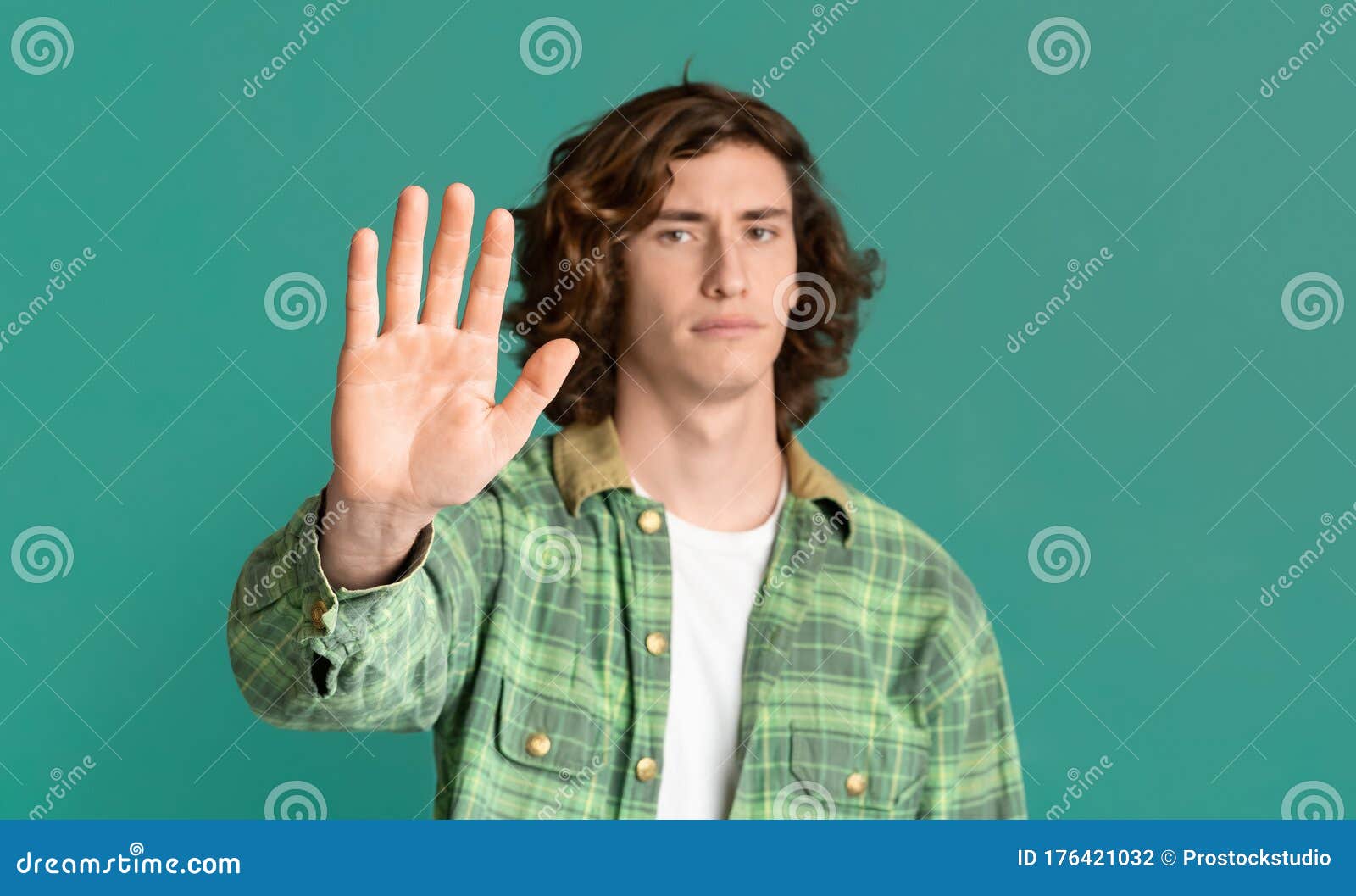 Expressing Rejection. Serious Millennial Guy Showing STOP Gesture on ...