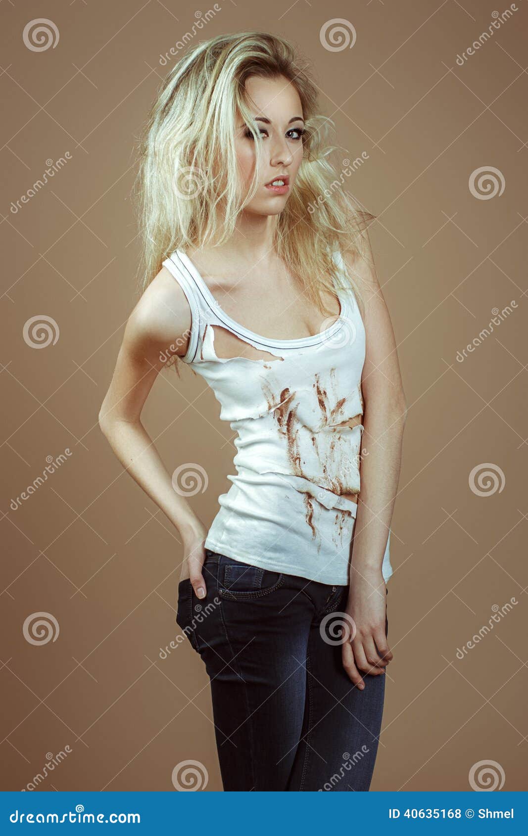 Expressive Blonde Girl in a White Torn Top Stock Photo - Image of ...