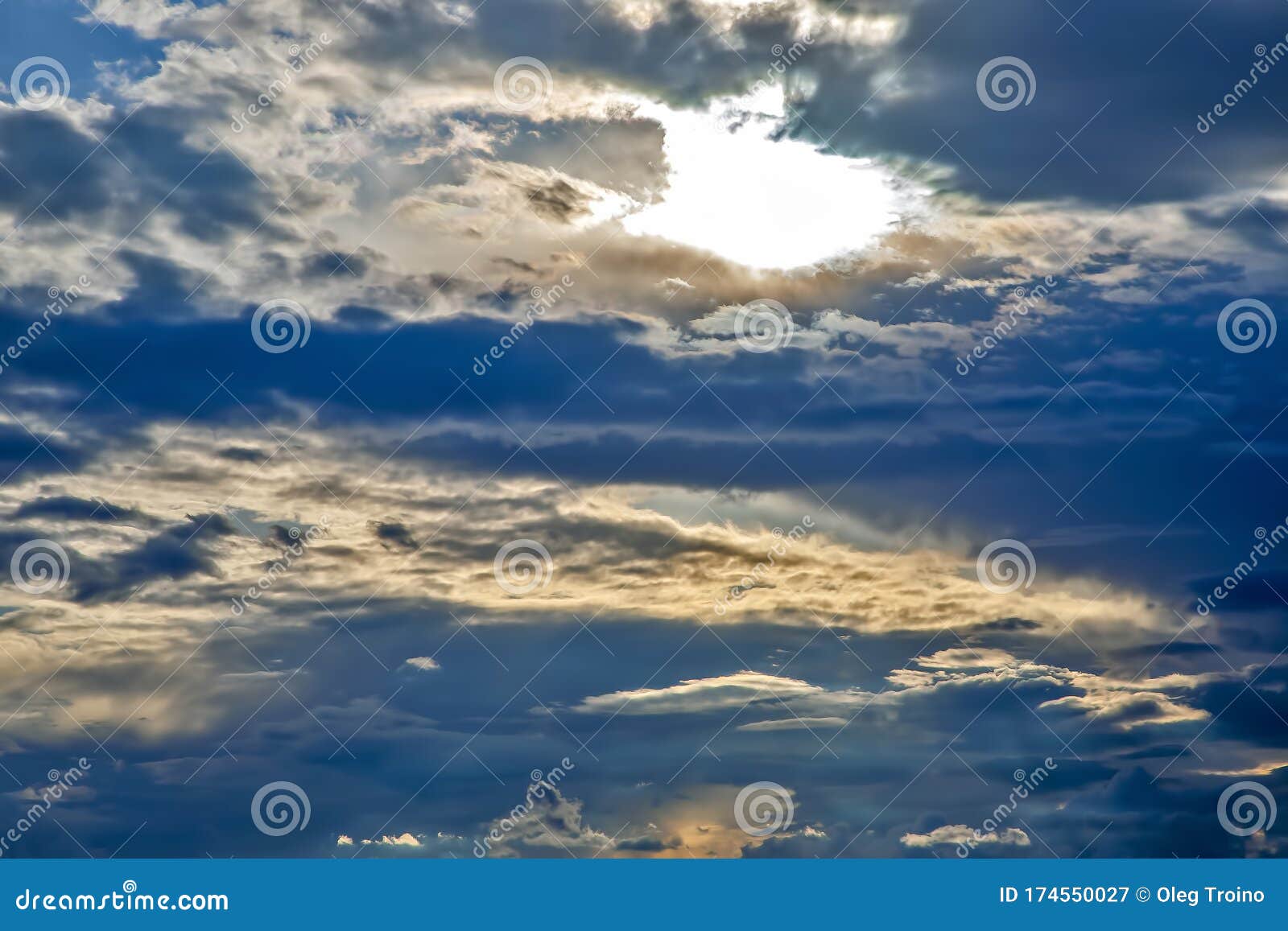 The Expressive Contrast of the Clouds in the Sky. Sunset with Bright ...