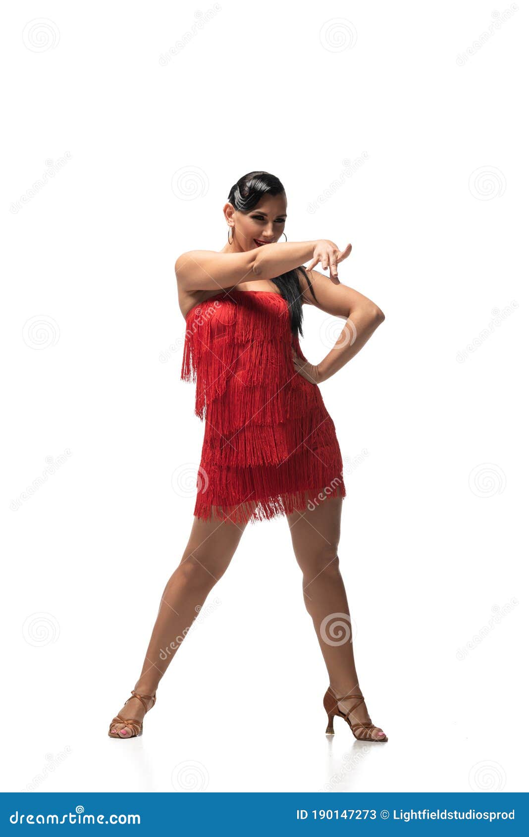 Dancer Looking Away and Pointing with Finger while Performing Tango on ...