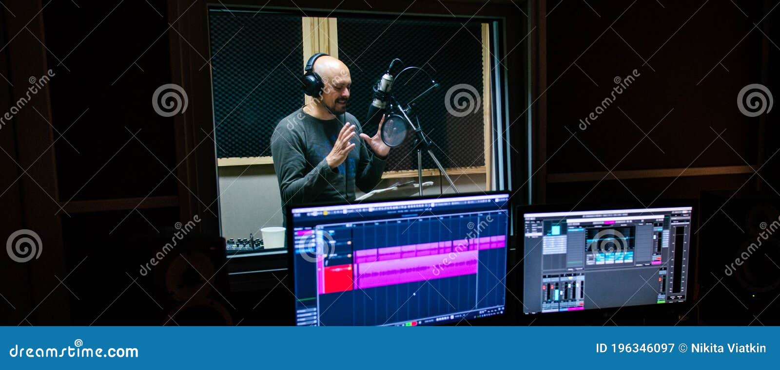 Expressive Man in Recording Studio. Stock Image - Image of headphones ...