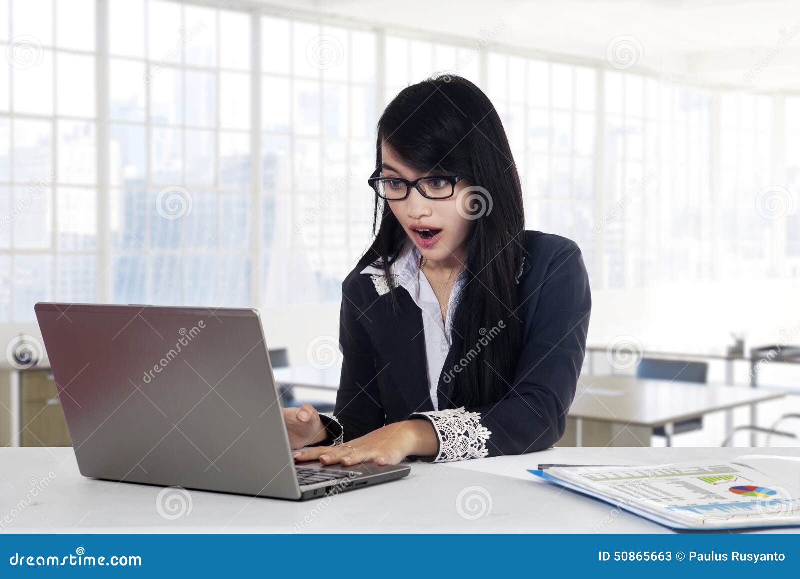 Expressive Manager Looking at Laptop Stock Image - Image of girl ...