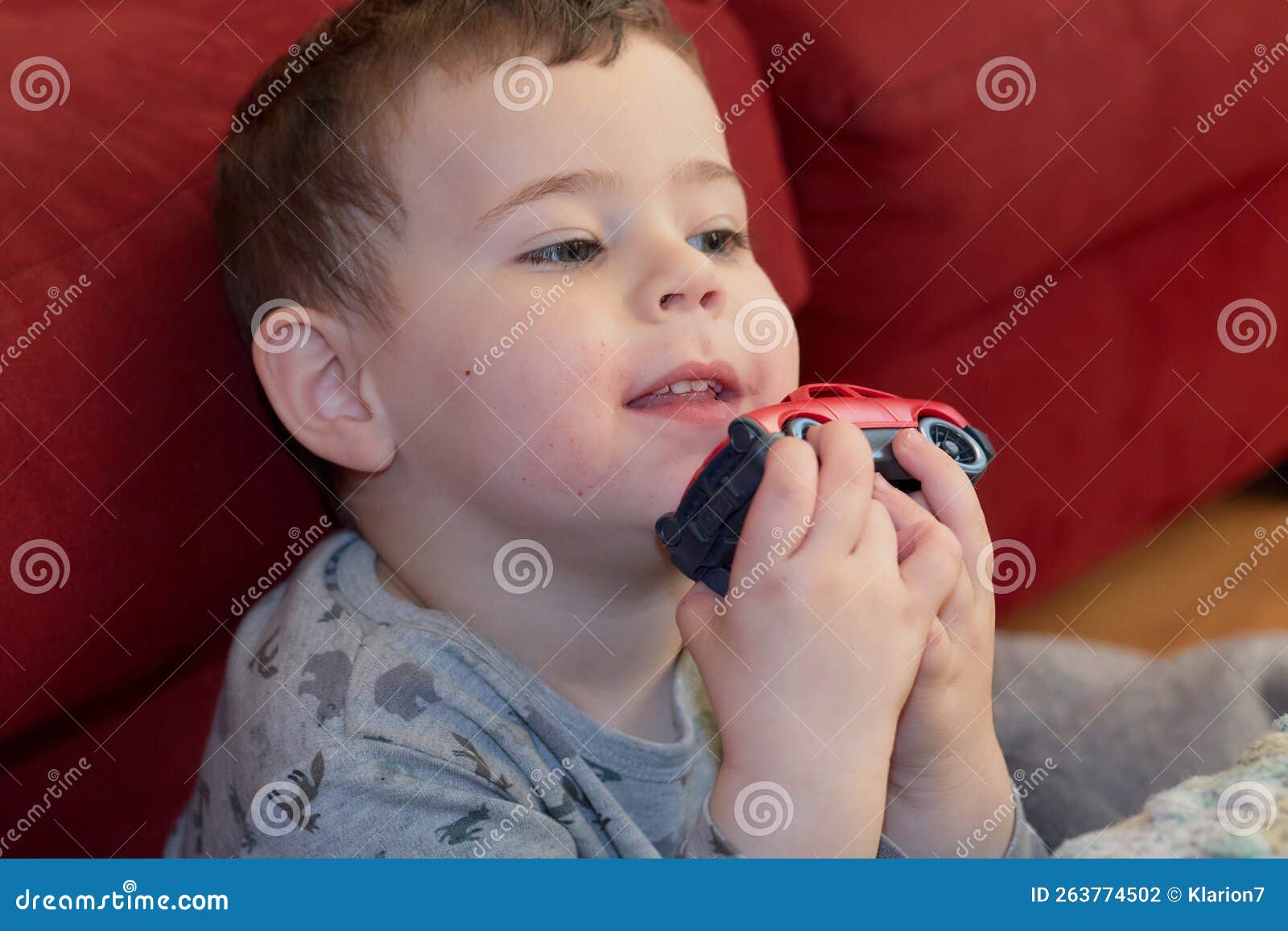 Expressive Young Boy Playing with Toys at Home Stock Photo - Image of ...