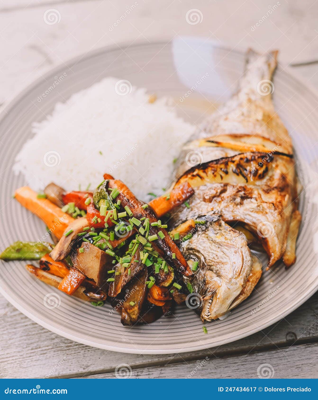 Exquisite Dish of Baked Sea Bream with White Rice Stock Image - Image ...