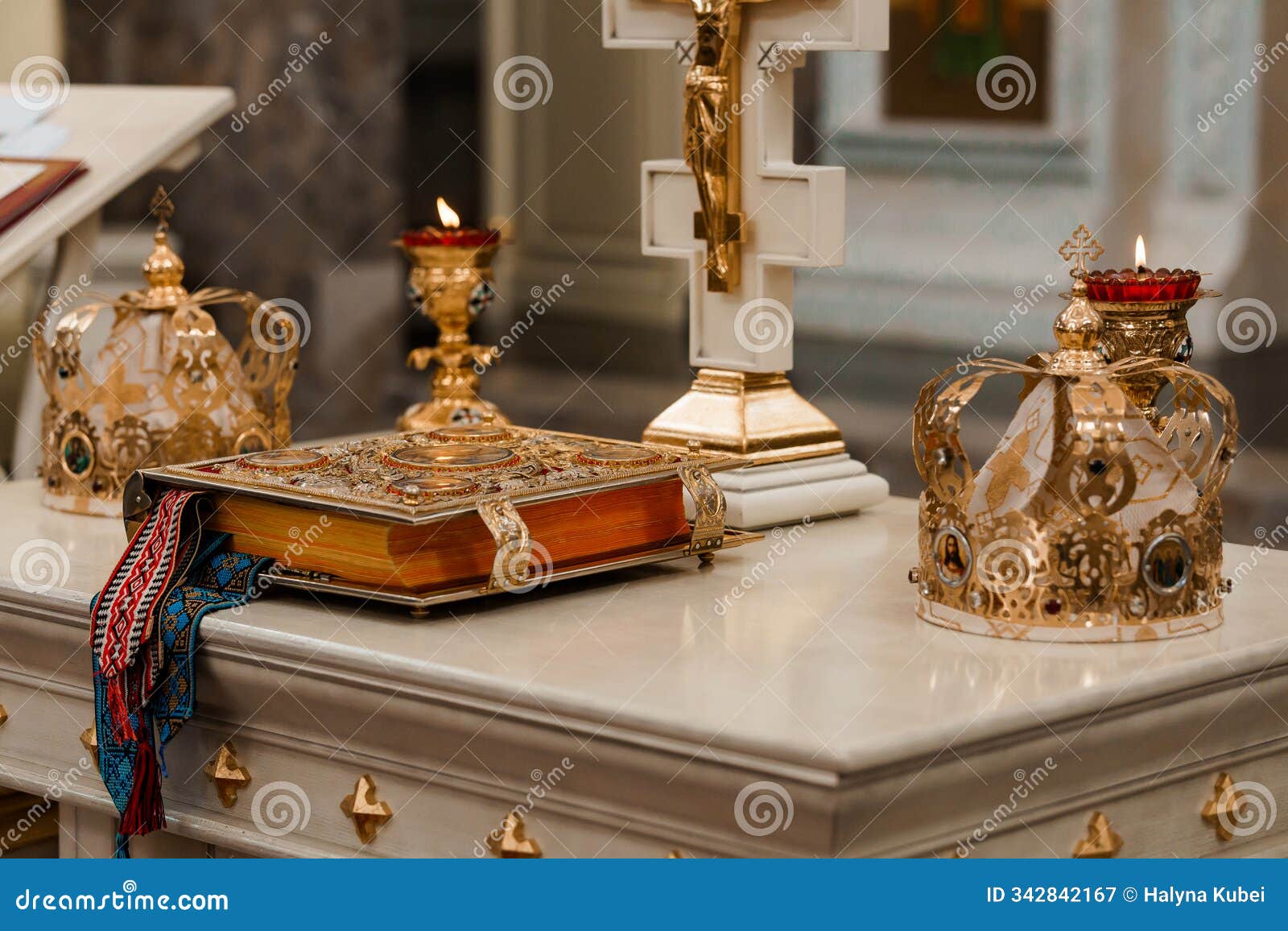 Exquisite Display of Religious Artifacts with Golden Crowns and Lit ...