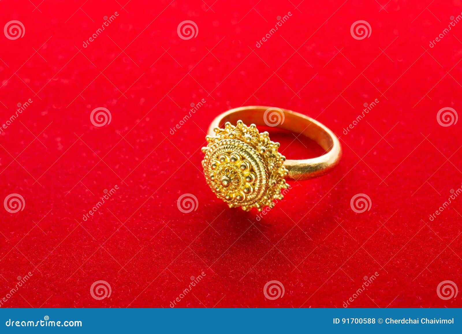 Exquisite Gold Ring on Red Background Stock Photo - Image of texture ...