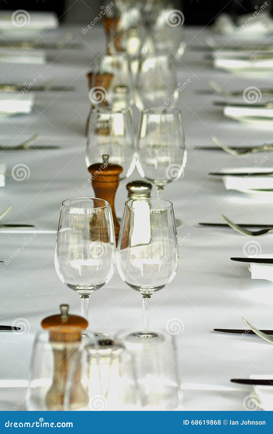 An Extended Dining Table with Stock Photo - Image of forks, cafe: 68619868