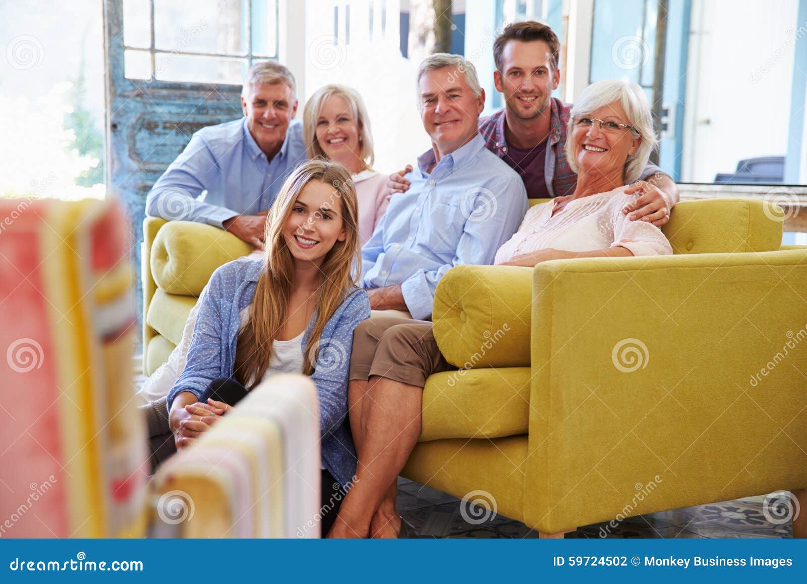 Extended Family Group at Home Relaxing in Lounge Stock Photo - Image of ...