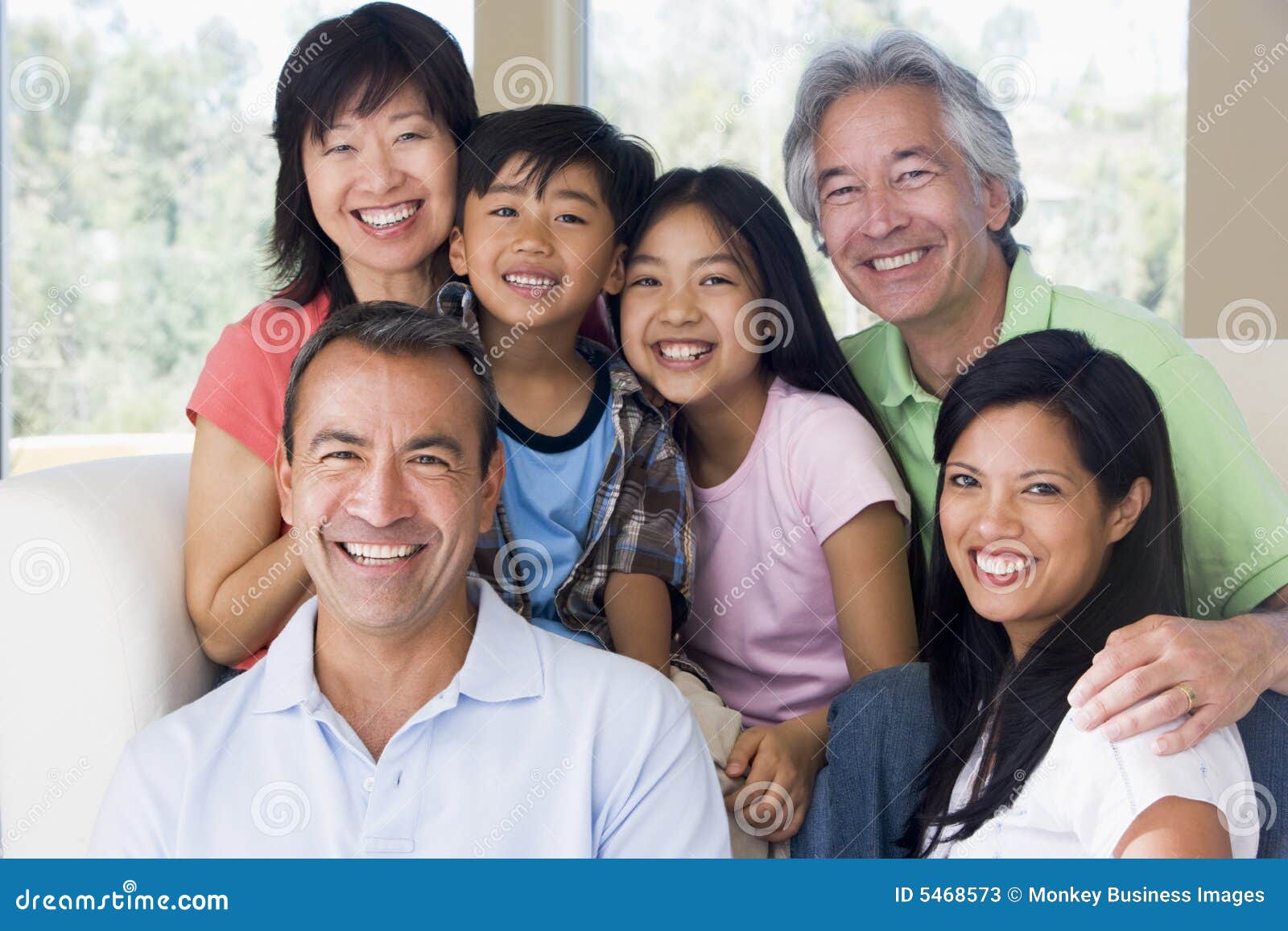 Extended Family in Living Room Smiling Stock Image - Image of middle ...