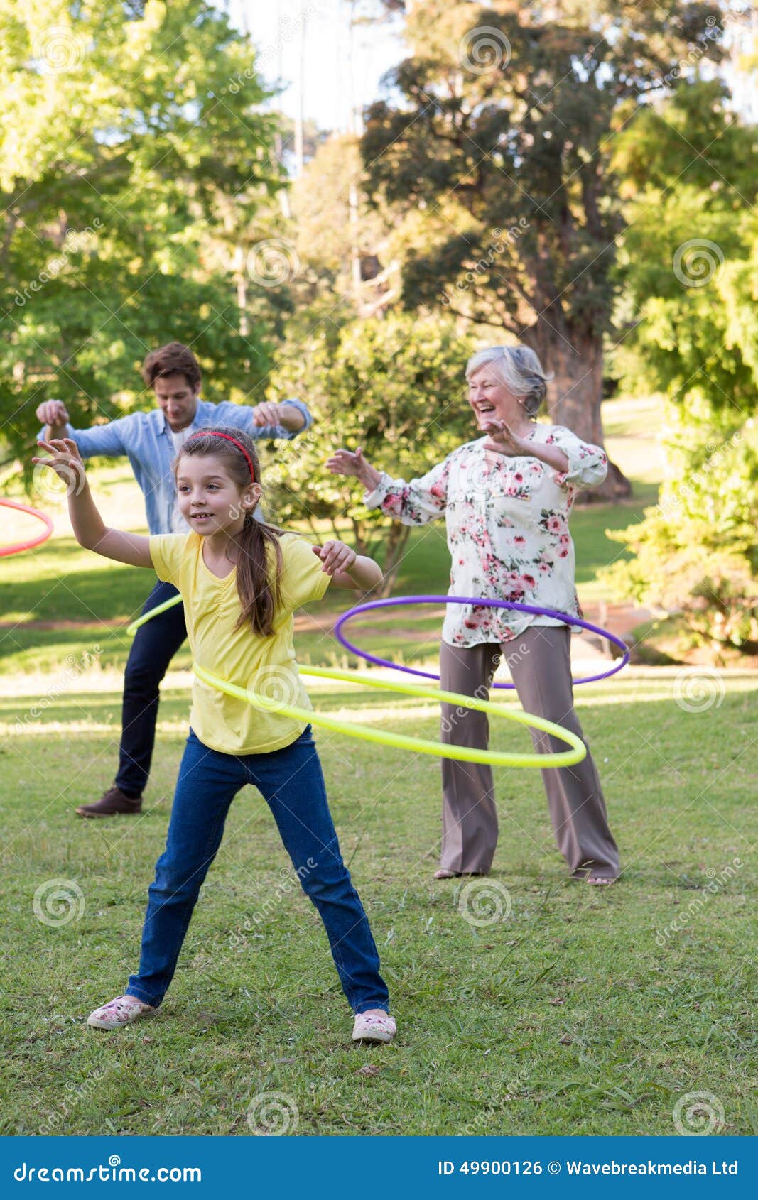 Extended Family Playing with Hula Hoops Stock Photo - Image of ...