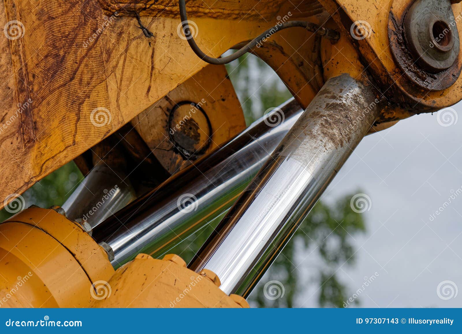 Extended piston rods stock image. Image of extended, bucket - 97307143
