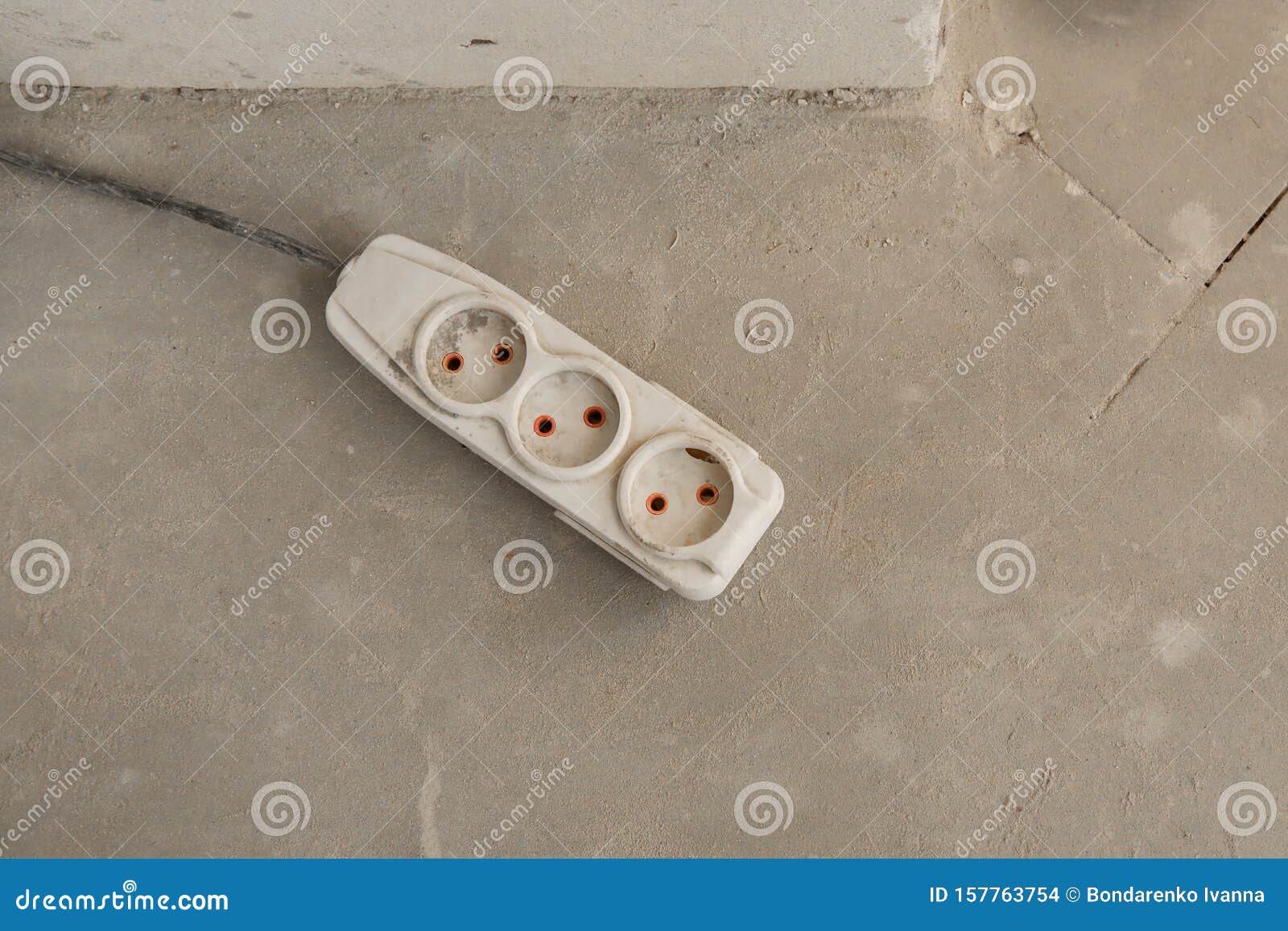 Extension Socket Plug on a Concrete Floor Stock Photo - Image of dirty ...