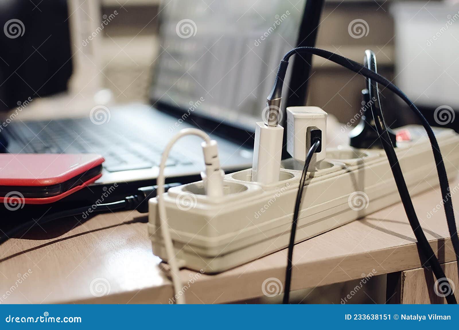 Extension Socket with Various Chargers and Devices Connected ...