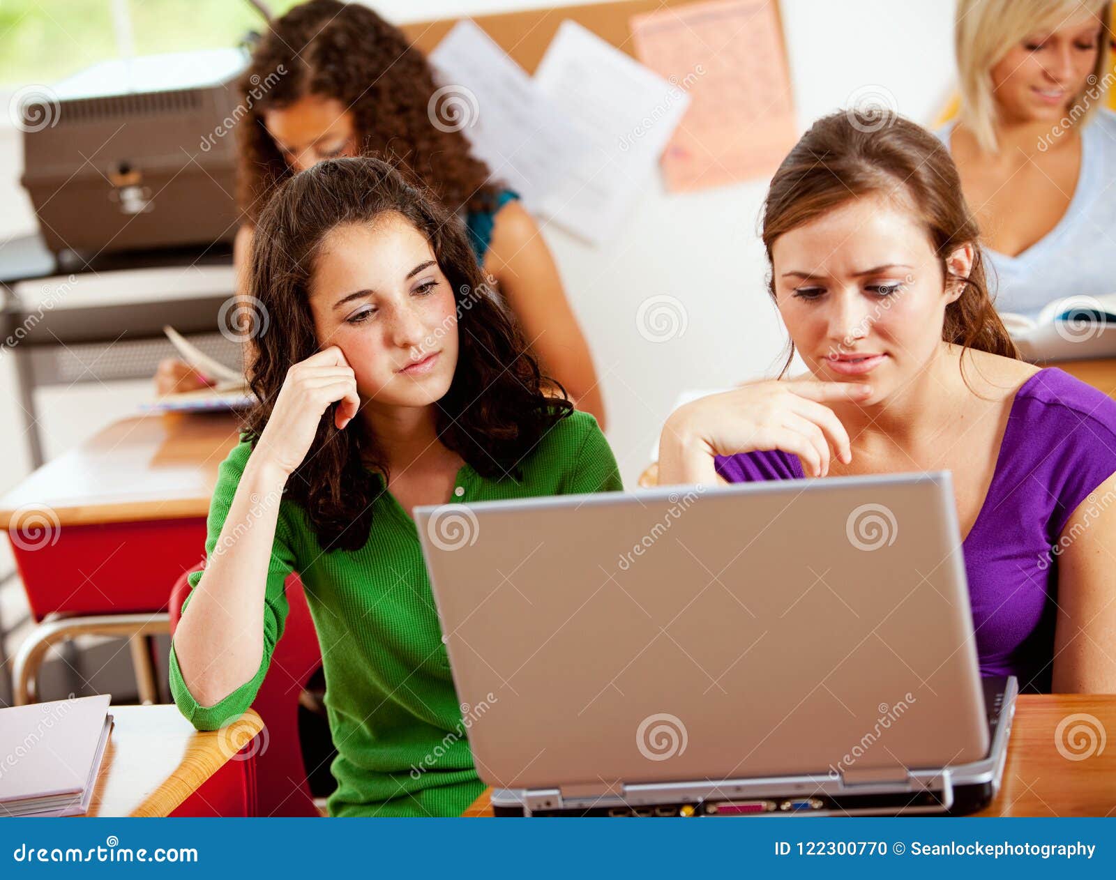 Students: Teens Doing Research Together on Laptop Stock Photo - Image ...