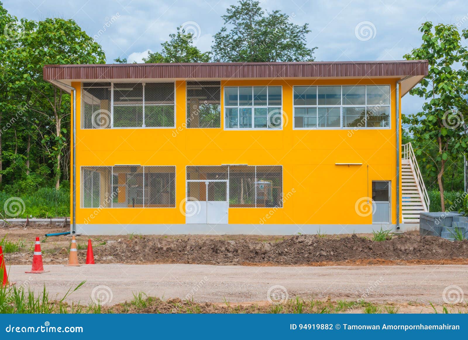 Exterior of Empty Concrete Yellow Factory Warehouse Building Stock ...