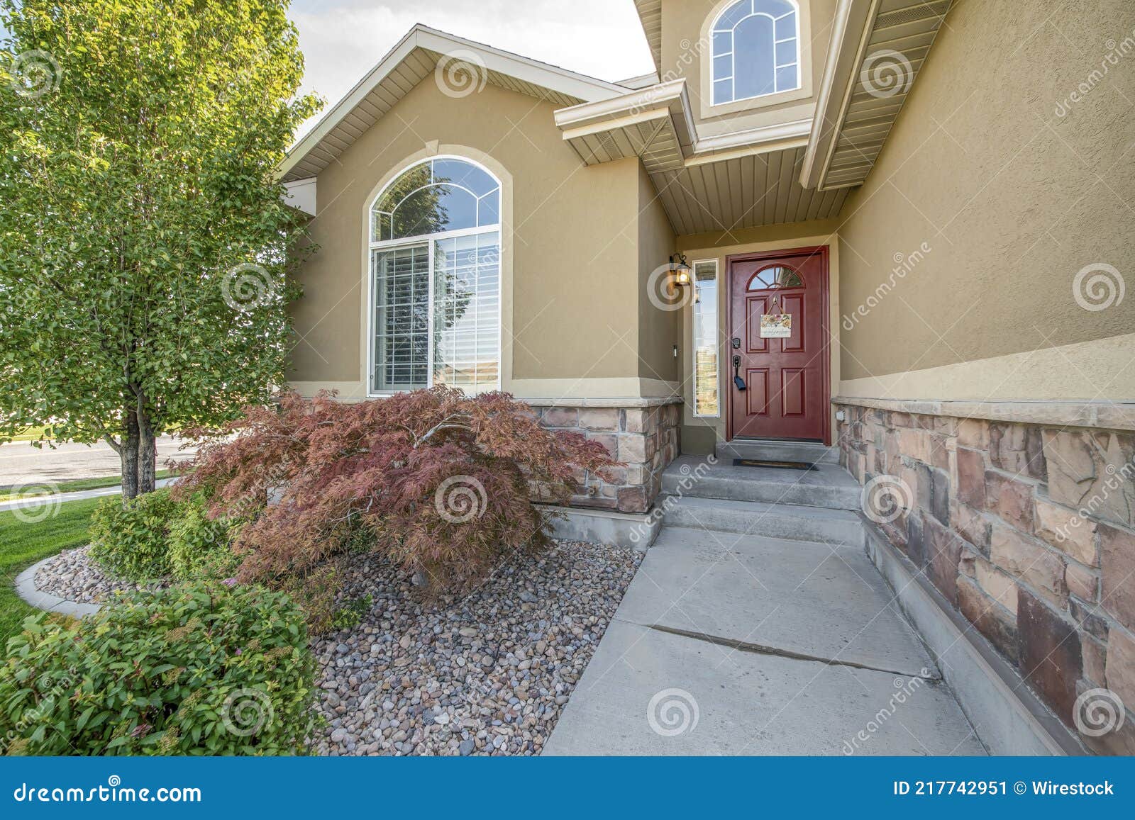 Exterior of a House with a Red Door and Big Windows Stock Image - Image ...
