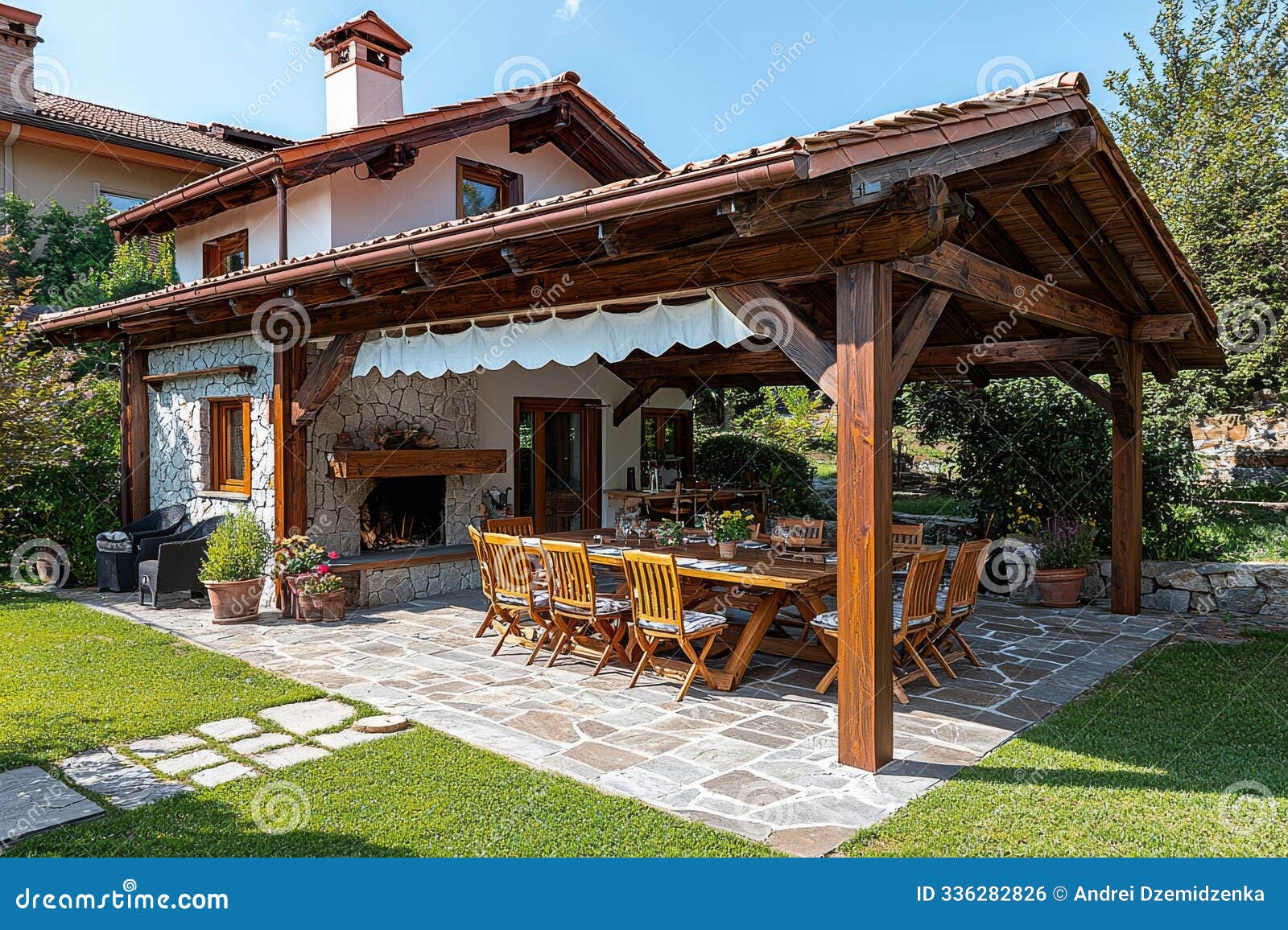 Exterior of Luxury Villa with Long Table and Chairs on Veranda Stock ...