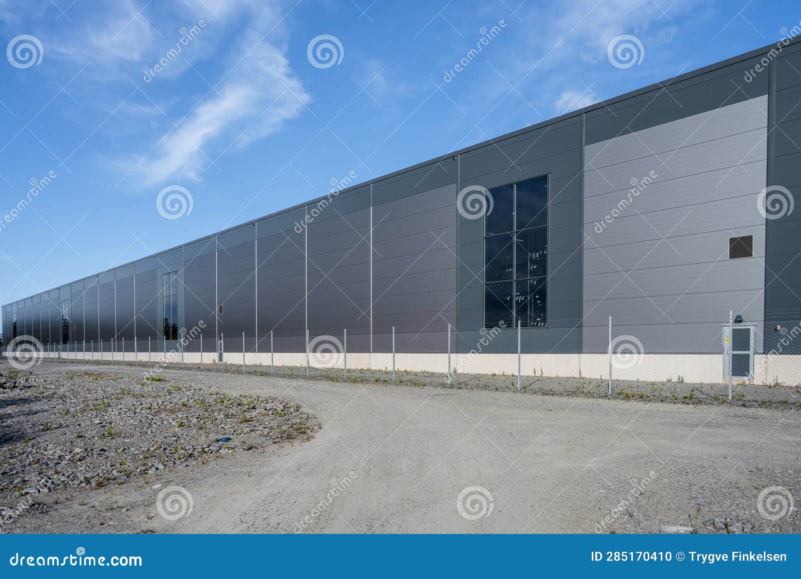 Exterior of a New and Large Grey Warehouse.. Stock Photo - Image of ...
