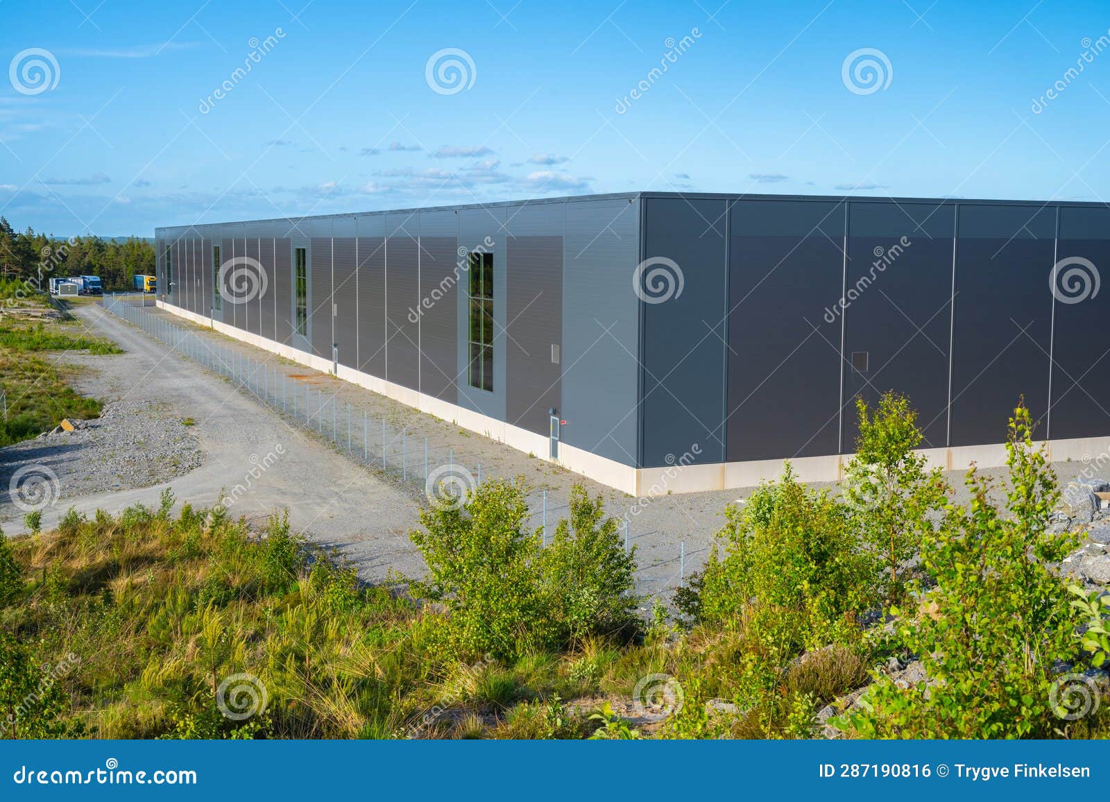 Exterior of a New and Large Grey Warehouse.. Stock Photo - Image of ...