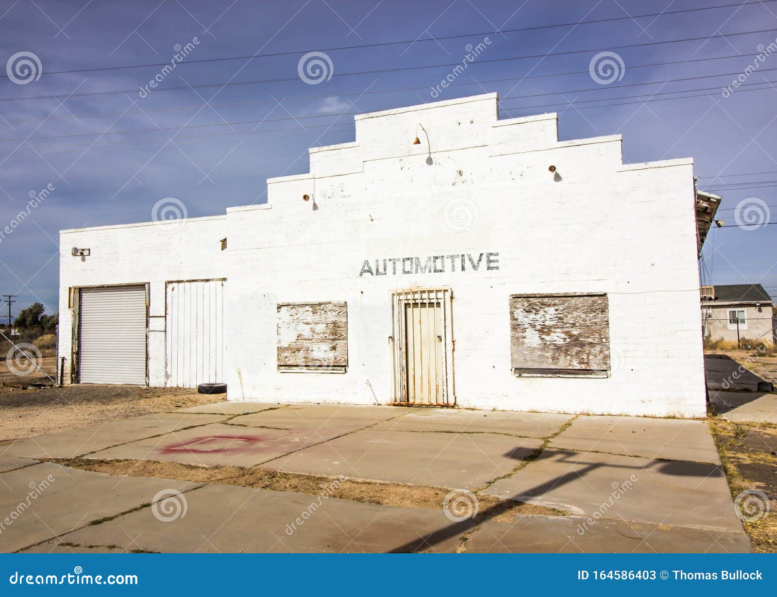 Exterior of Old Abandoned Garage with Boarded Up Windows Stock Image ...