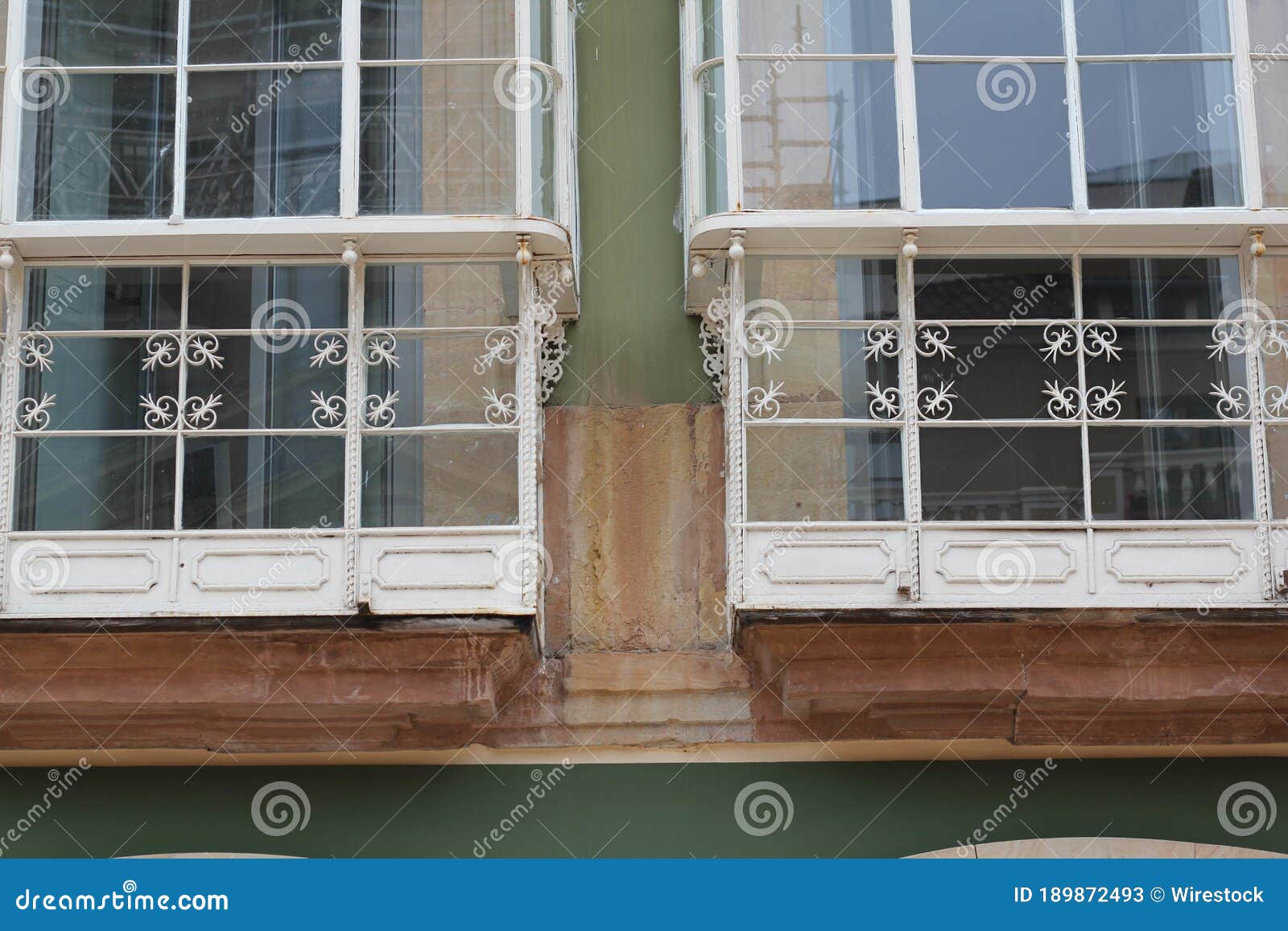 Exterior of an Old Building with Balcony Glass Windows Stock Image ...