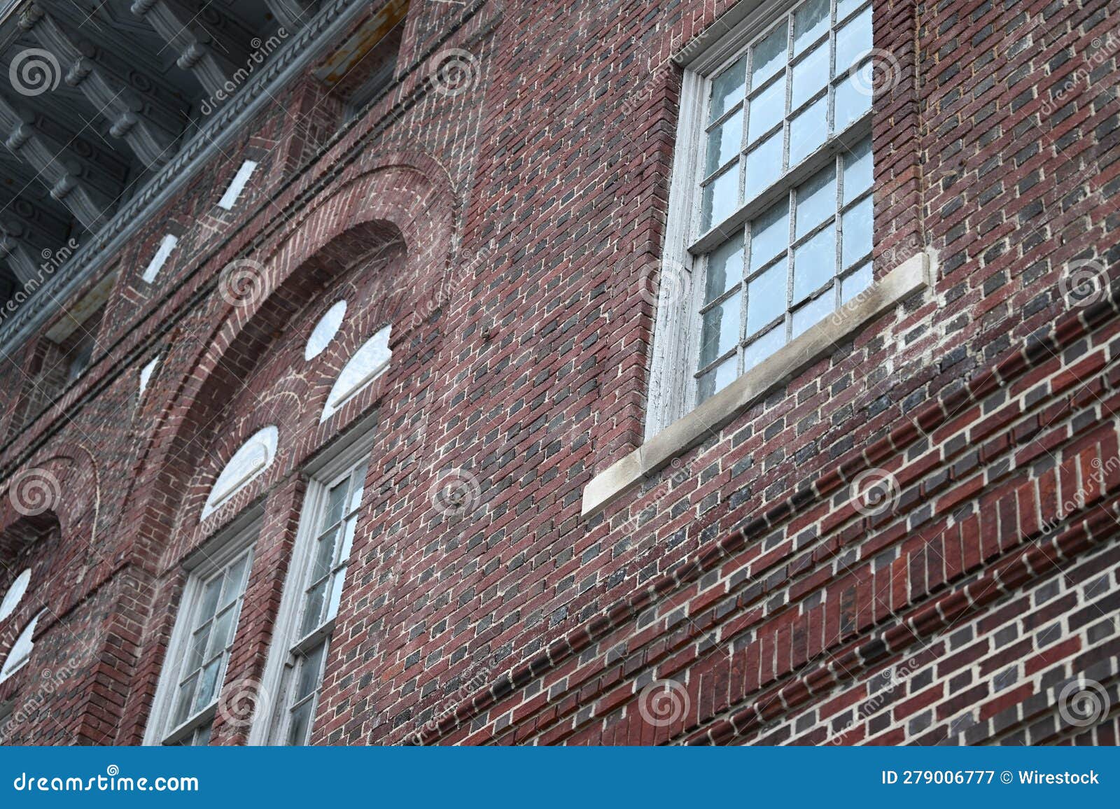 Exterior of an Old Building in an Urban Area with Arched Windows Stock ...