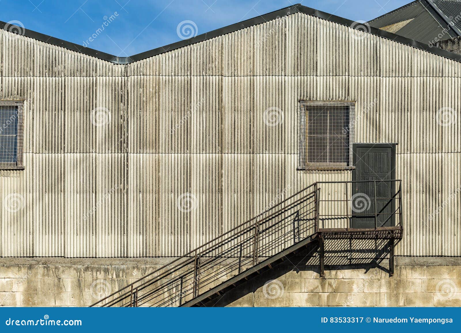 Exterior of old warehouse stock image. Image of iron - 83533317