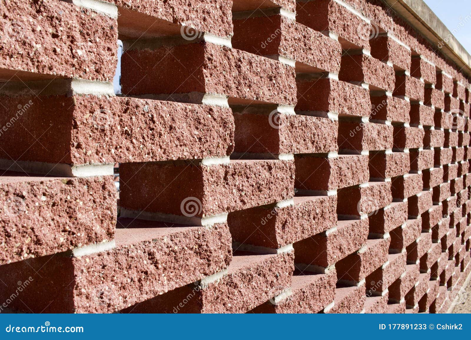 Exterior Red Stone Block Wall Texture Background with Open Weave ...