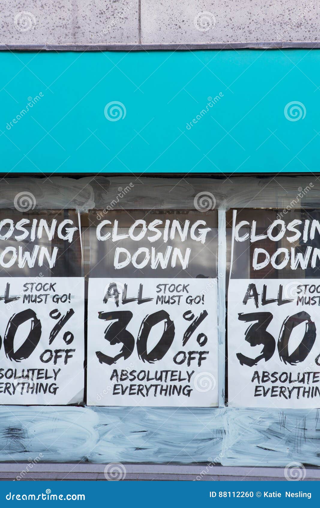 Exterior of Shop with Closing Down Notice in Window Stock Photo - Image ...