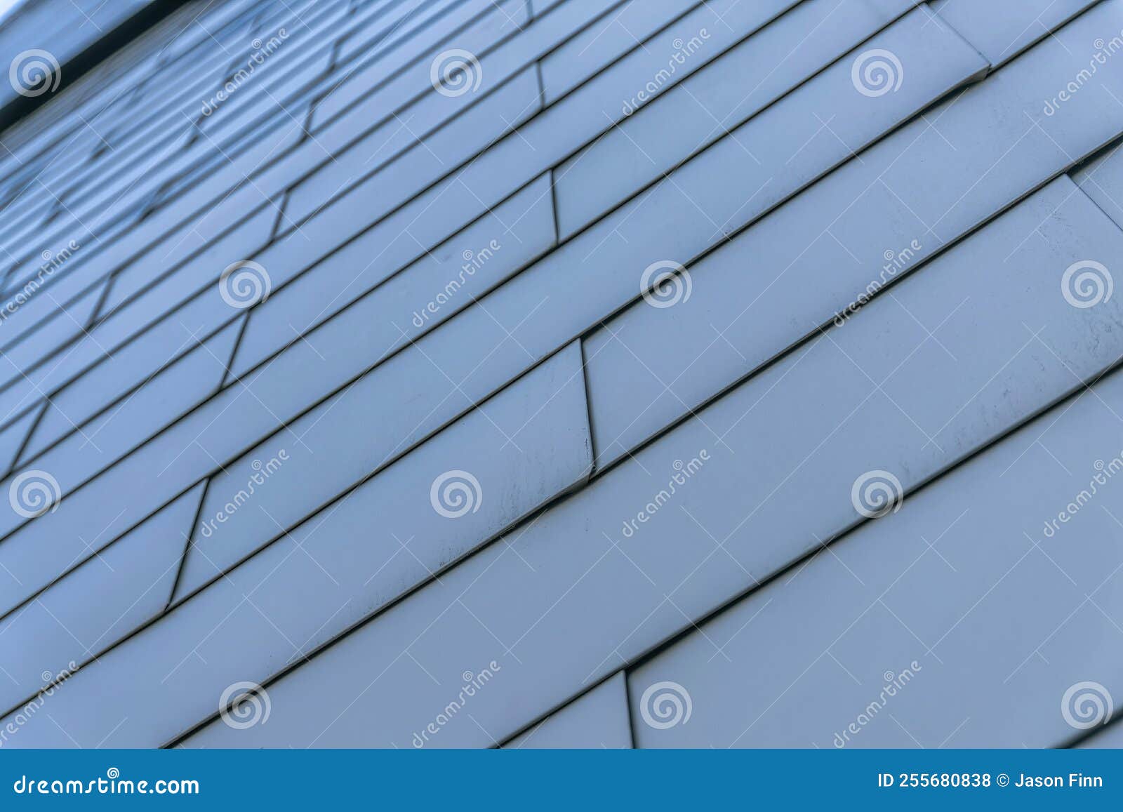 Exterior View of a Building with Close Up on the Wall with Geometric ...