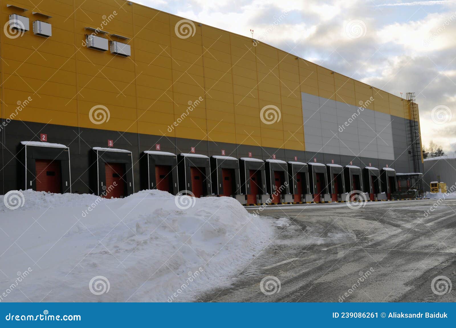 Exterior View of a Large Warehouse in Winter. Driveways Stock Image ...