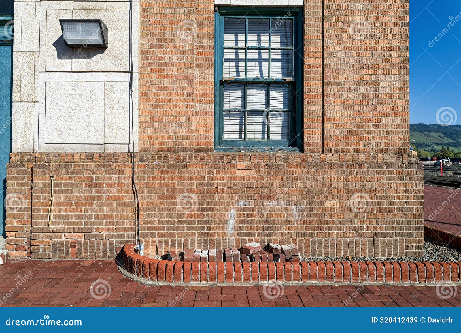 The Exterior Window in an Old Brick and Stone Train Station Surrounded ...