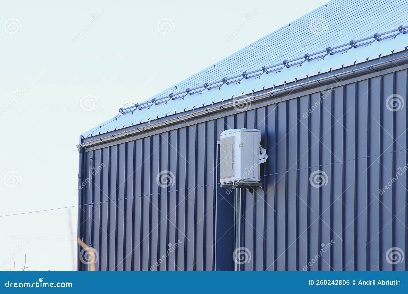 An External Air Conditioner Unit on the Facade of the House in Winter ...