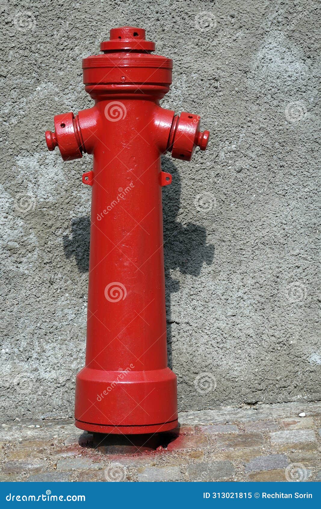 External Fire Hydrant Installed on a Paved Footway with a Gray Wall ...