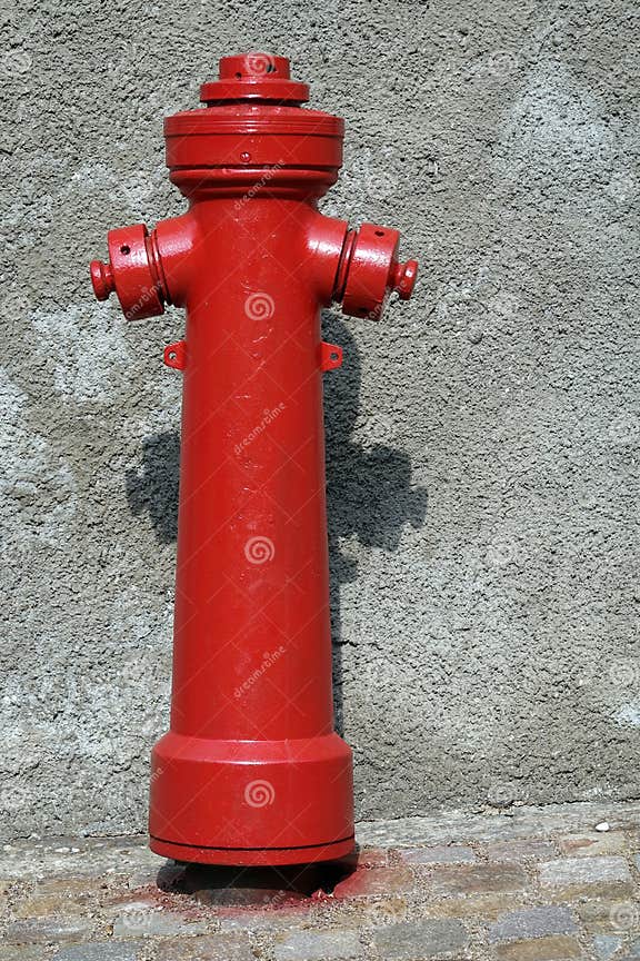 External Fire Hydrant Installed on a Paved Footway with a Gray Wall ...