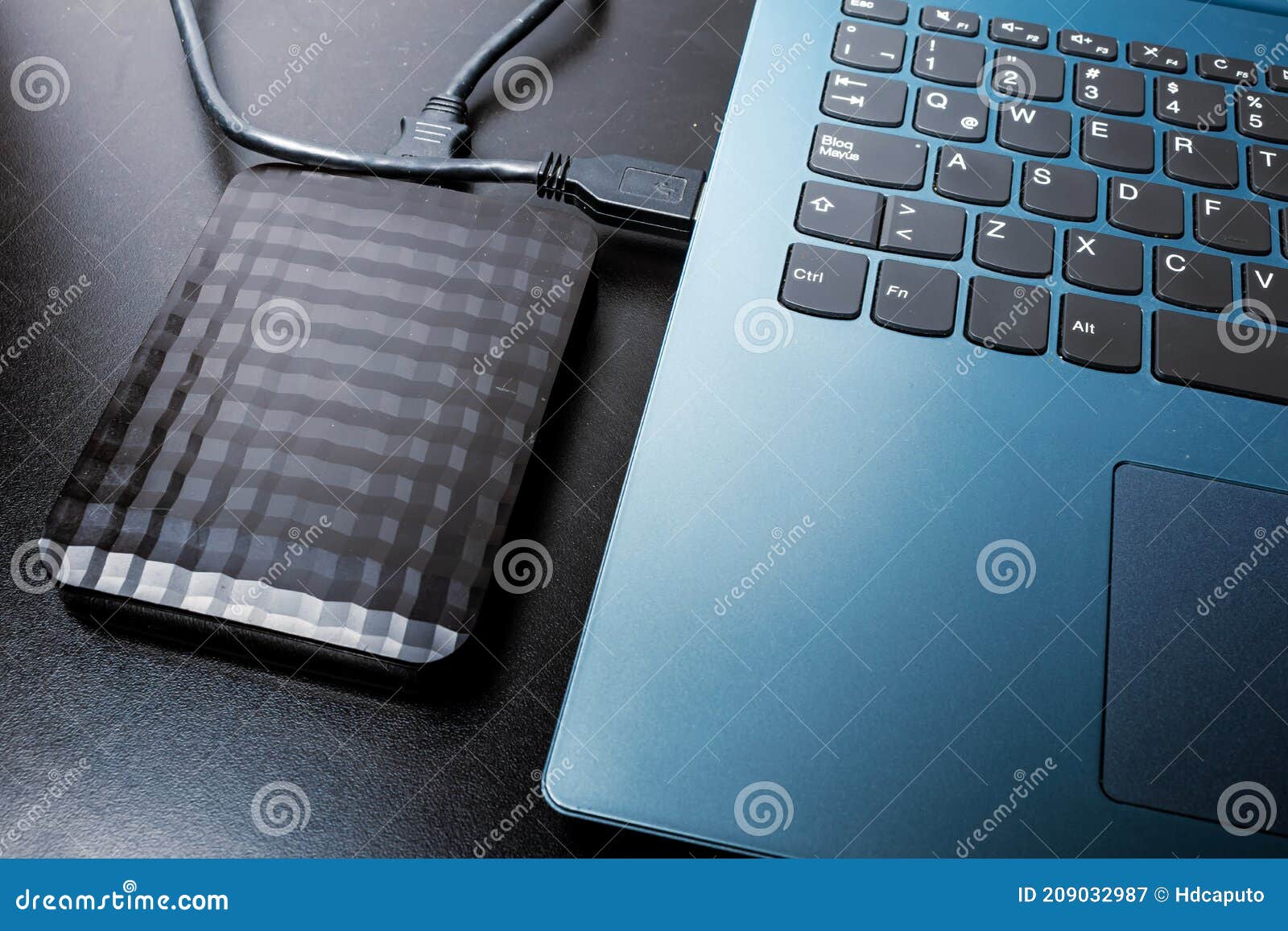 External Hard Drive with Usb Cable Connected To a Laptop or Notebook ...