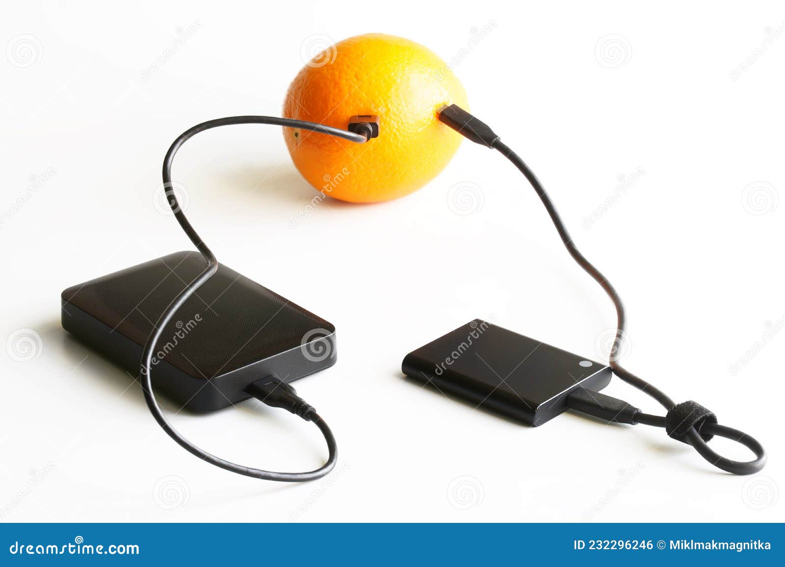 The External SSD and External HDD are Wired To a Fresh Orange. Concept ...