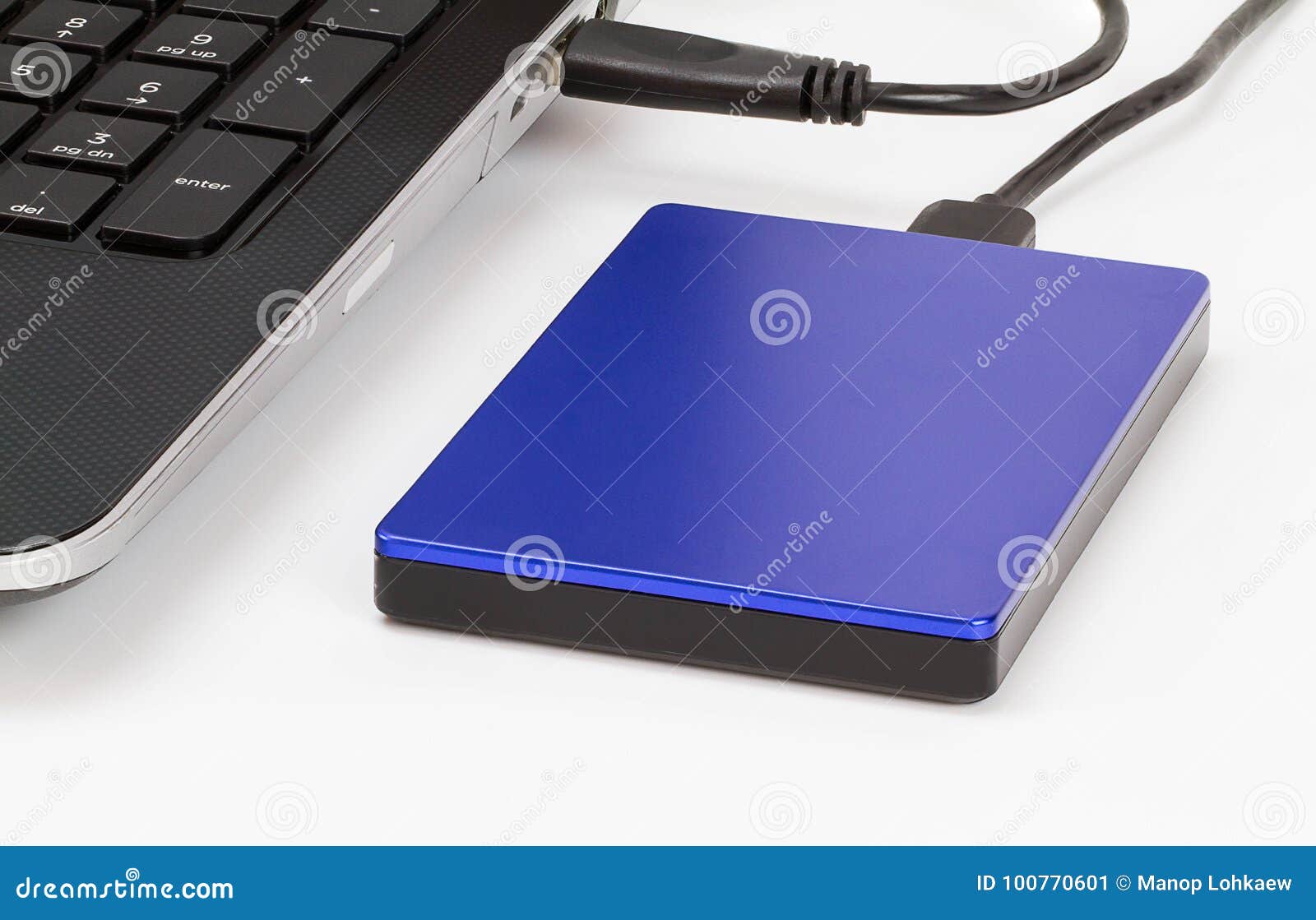 External Storage Connected To Laptop by Usb Cable on White Desk Stock ...