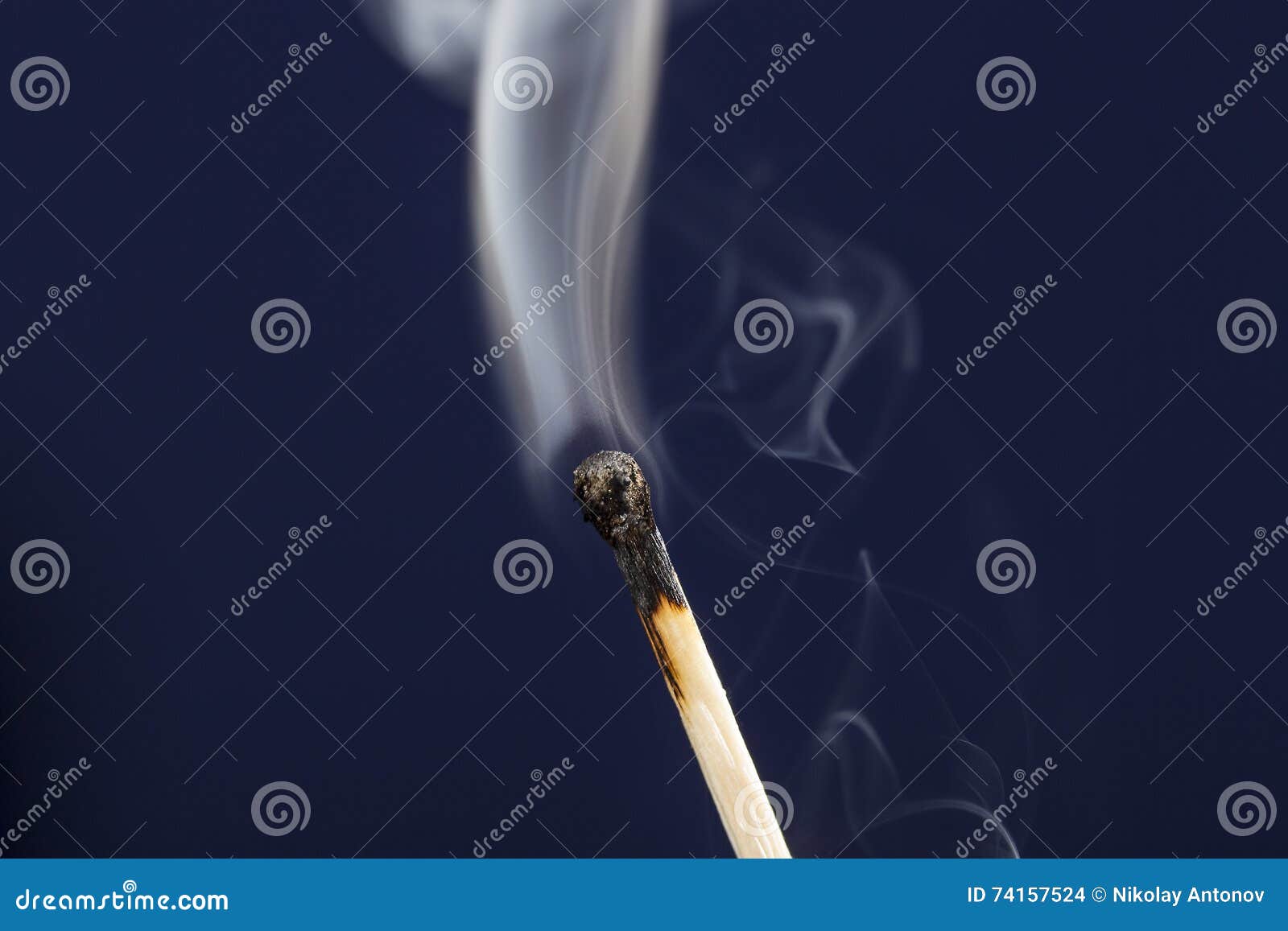Extinguished Match with Smoke on Dark Blue Background Stock Photo ...