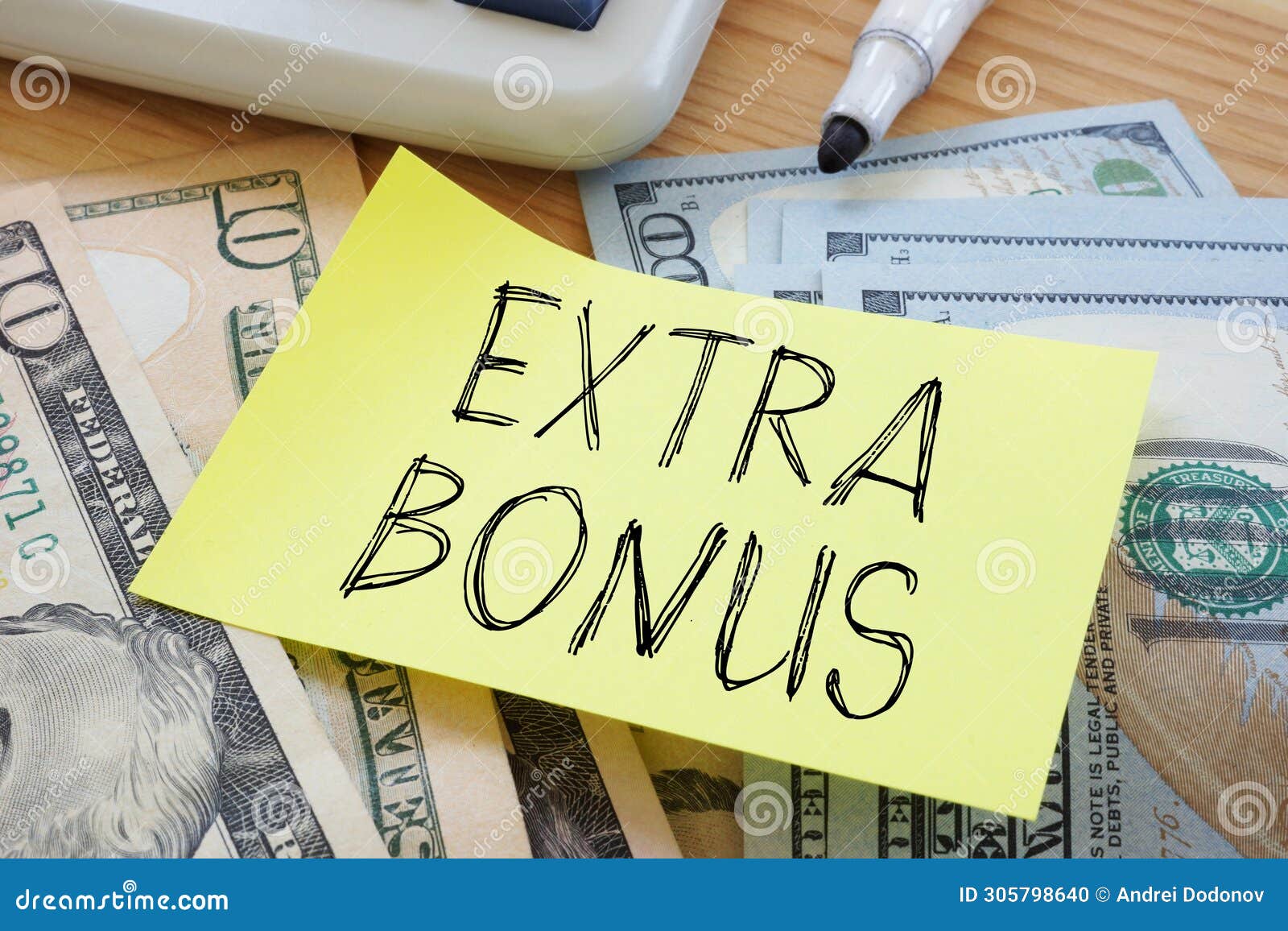 Extra Bonus is Shown Using the Text and Photo of Dollars Stock Photo ...